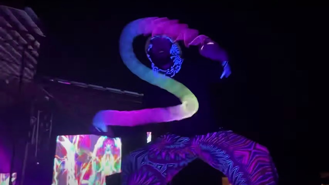 Blacklight Slinky Rave Tricks @ Music Festival - YouTube