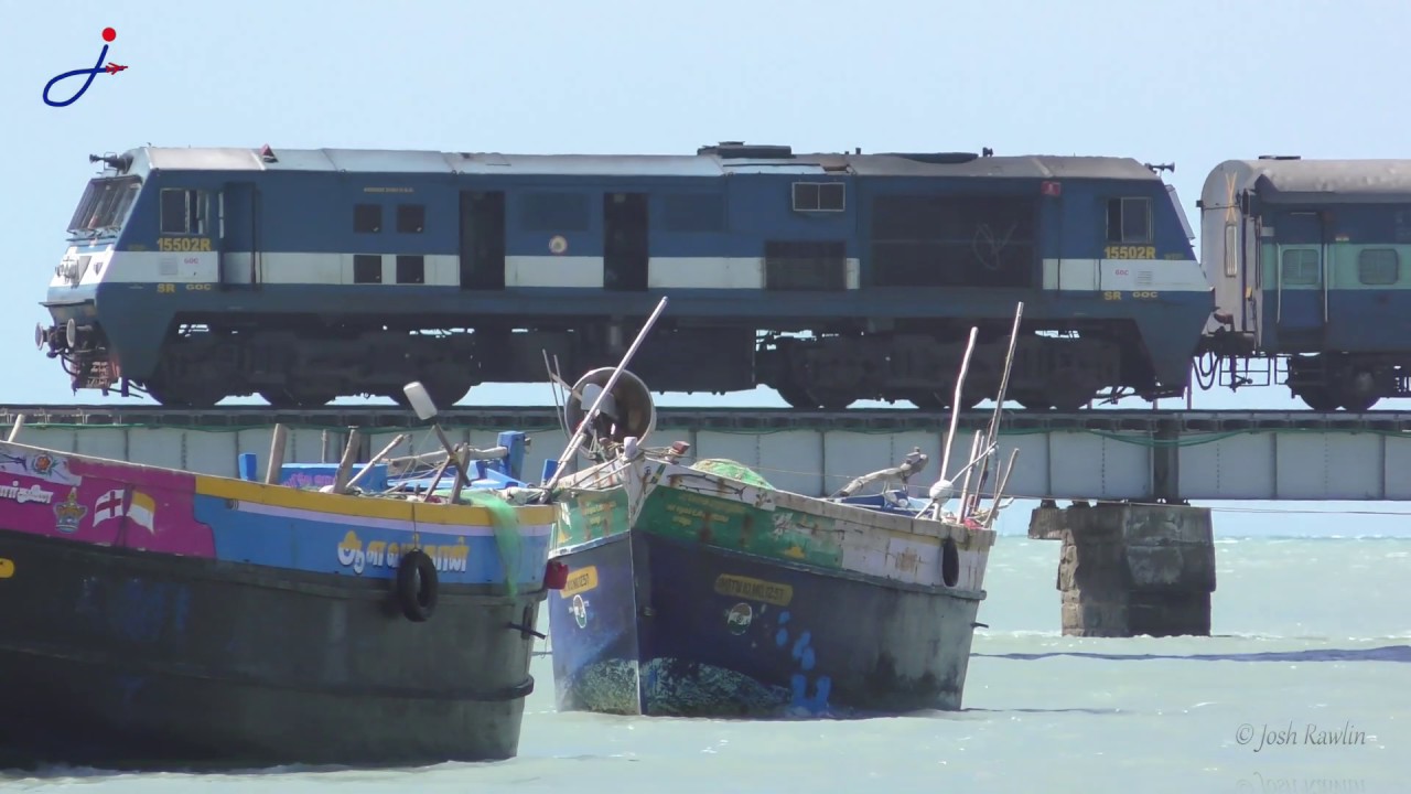 Pamban bridge train alongside fishing boats [4K] - YouTube