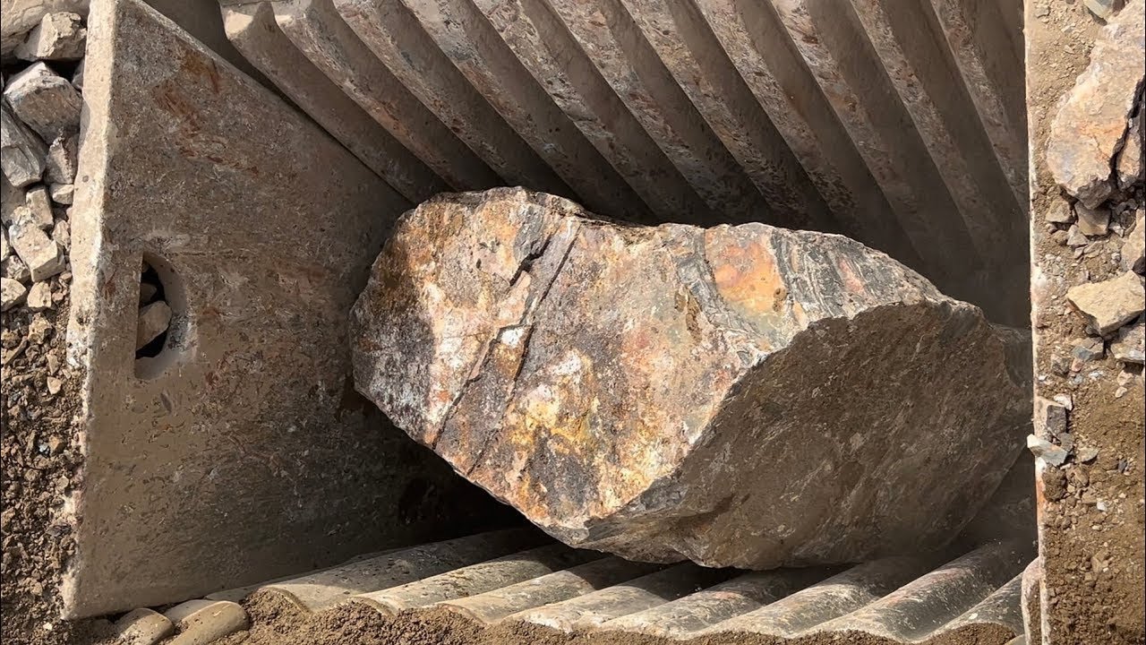 "How Do Rock Crushers Work? Crushing Huge Rocks with Extreme Force ...