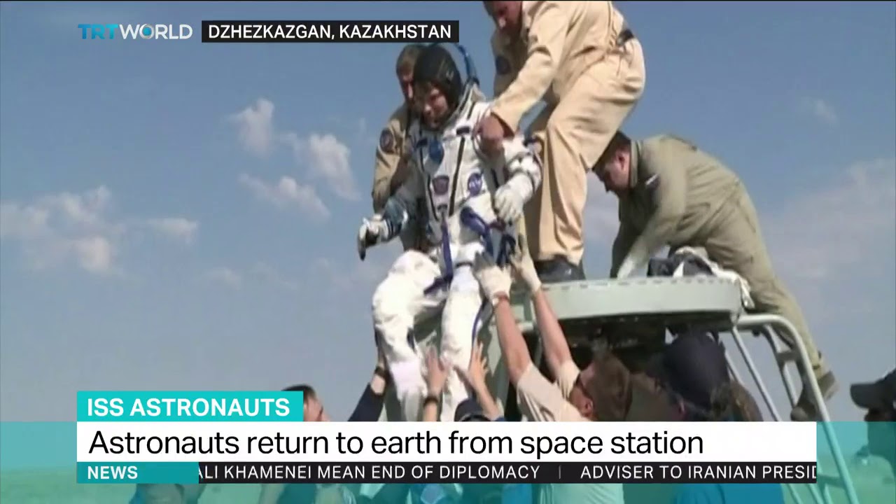 Three astronauts return to earth from ISS - YouTube
