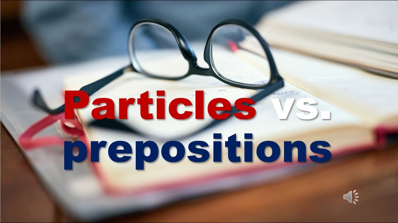 Particles vs prepositions - YouTube