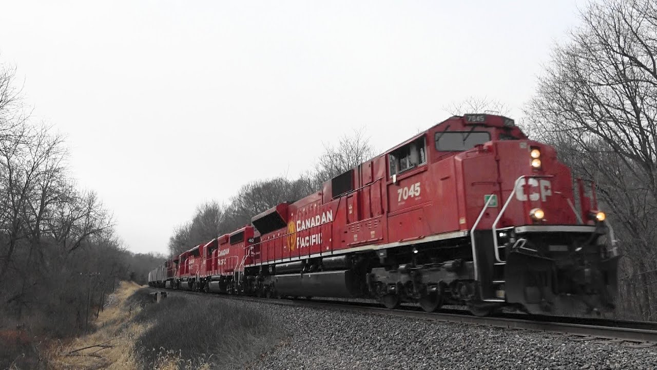 CP 7045 w/ CSX Power Leads Freight, Fruitland, IA - YouTube