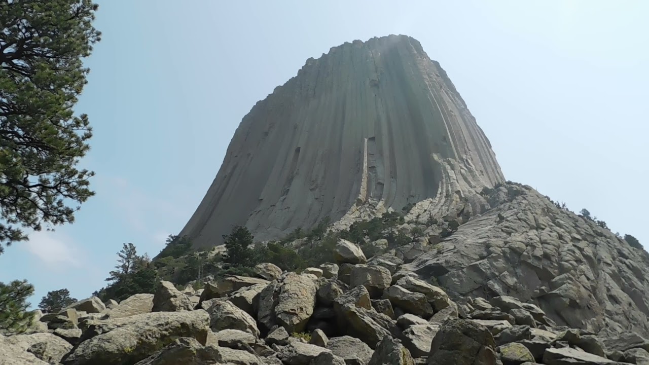 A up close look at Devils Tower And Climber on the Tower. - YouTube