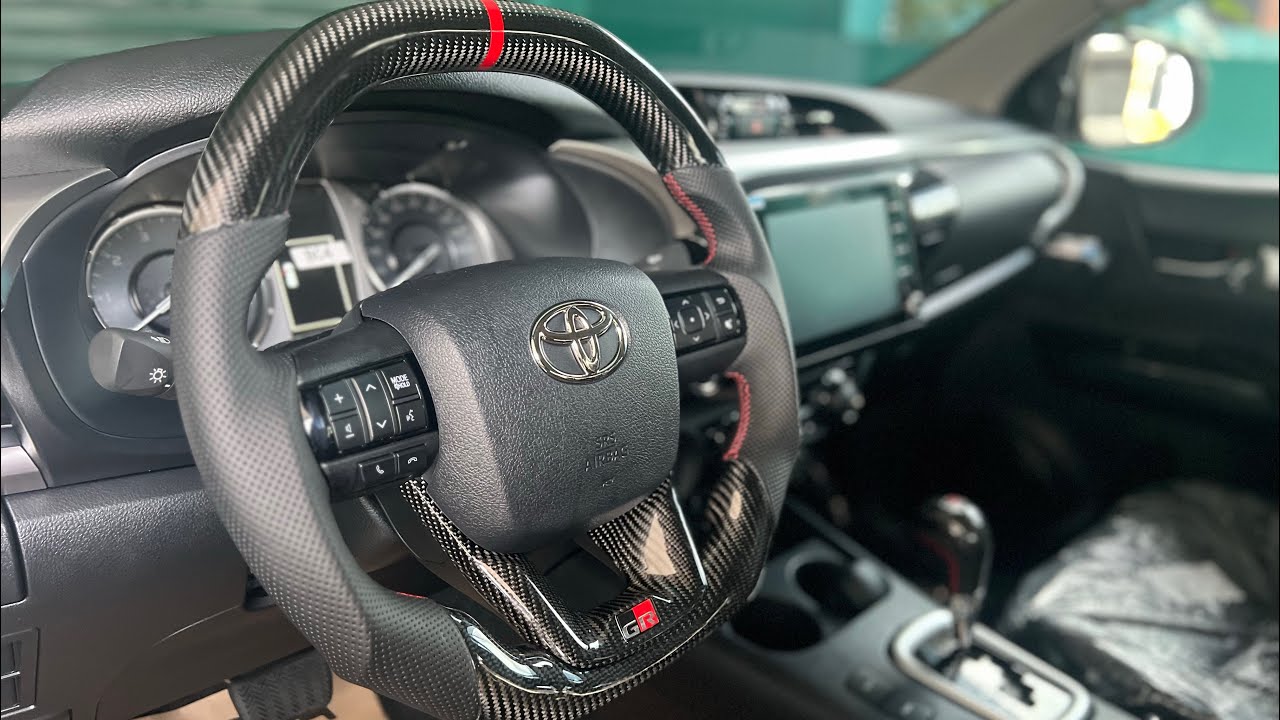 Carbon steering Hilux G - YouTube