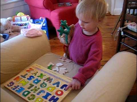 2-year old Grace with alphabet puzzle - YouTube