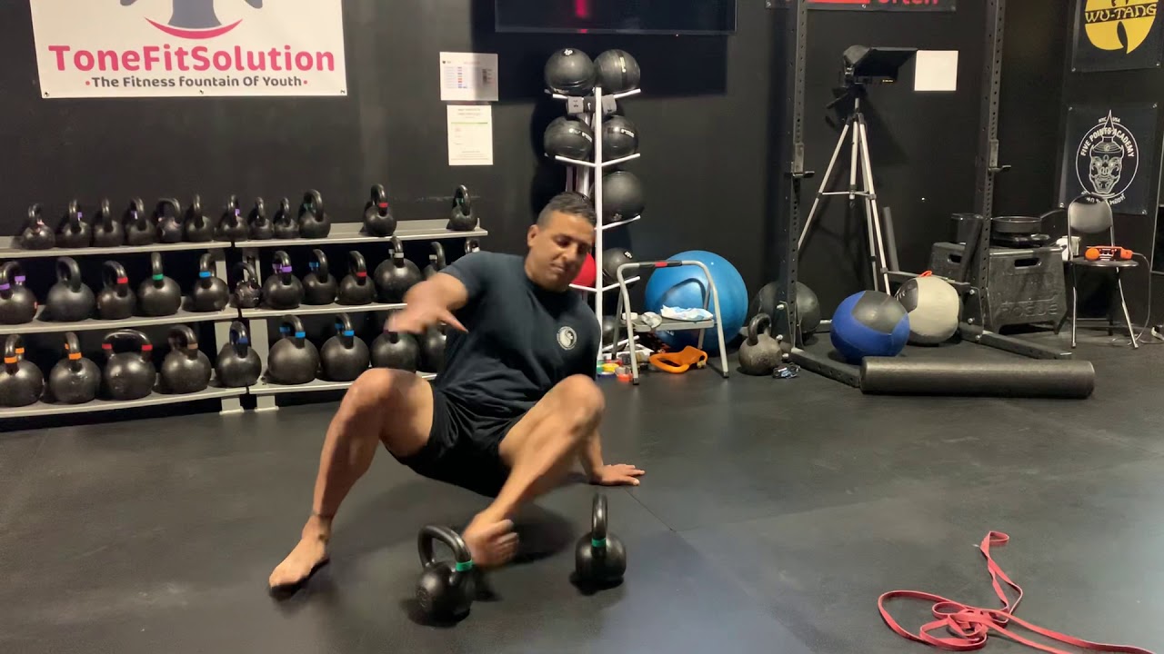 Seated Alternating KB Press - YouTube