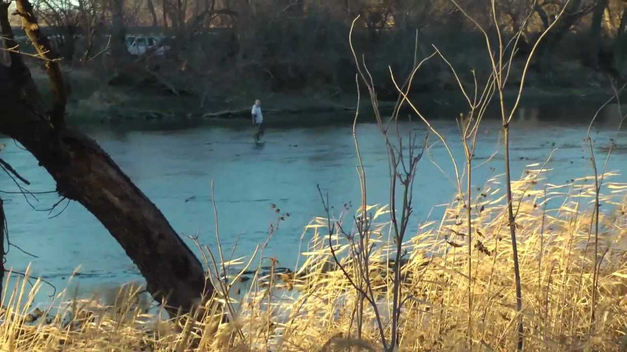 Man crosses river without much water. Rare on the Des Moines River ...