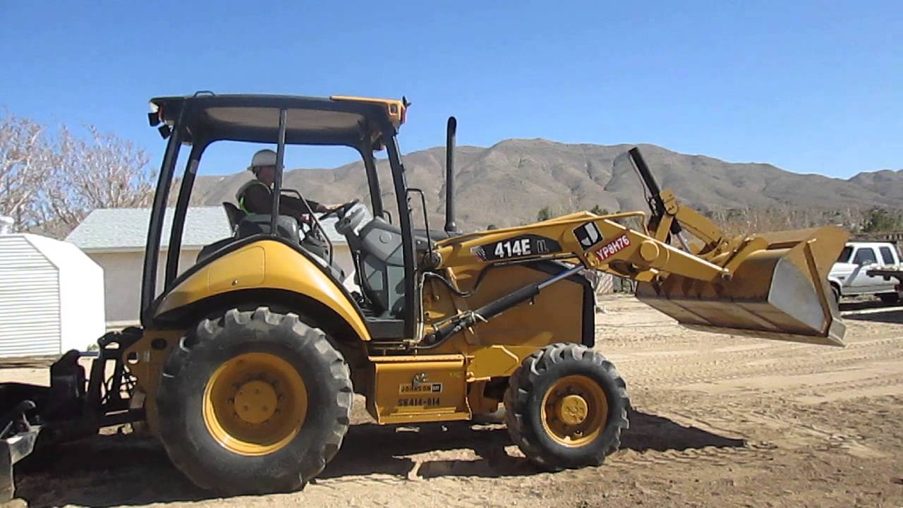 Skip loader grader 414e catapiller - YouTube