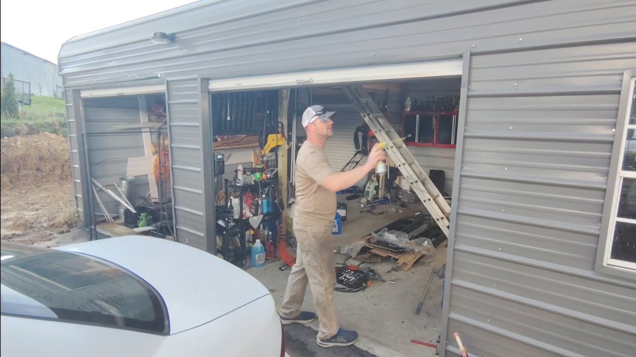 Hit your roll-up door tracks with a silicone spray lubricant...can't ...