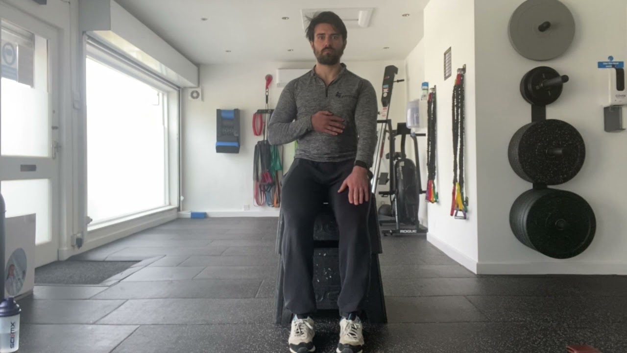 Seated Isometric Hip Flexion - YouTube