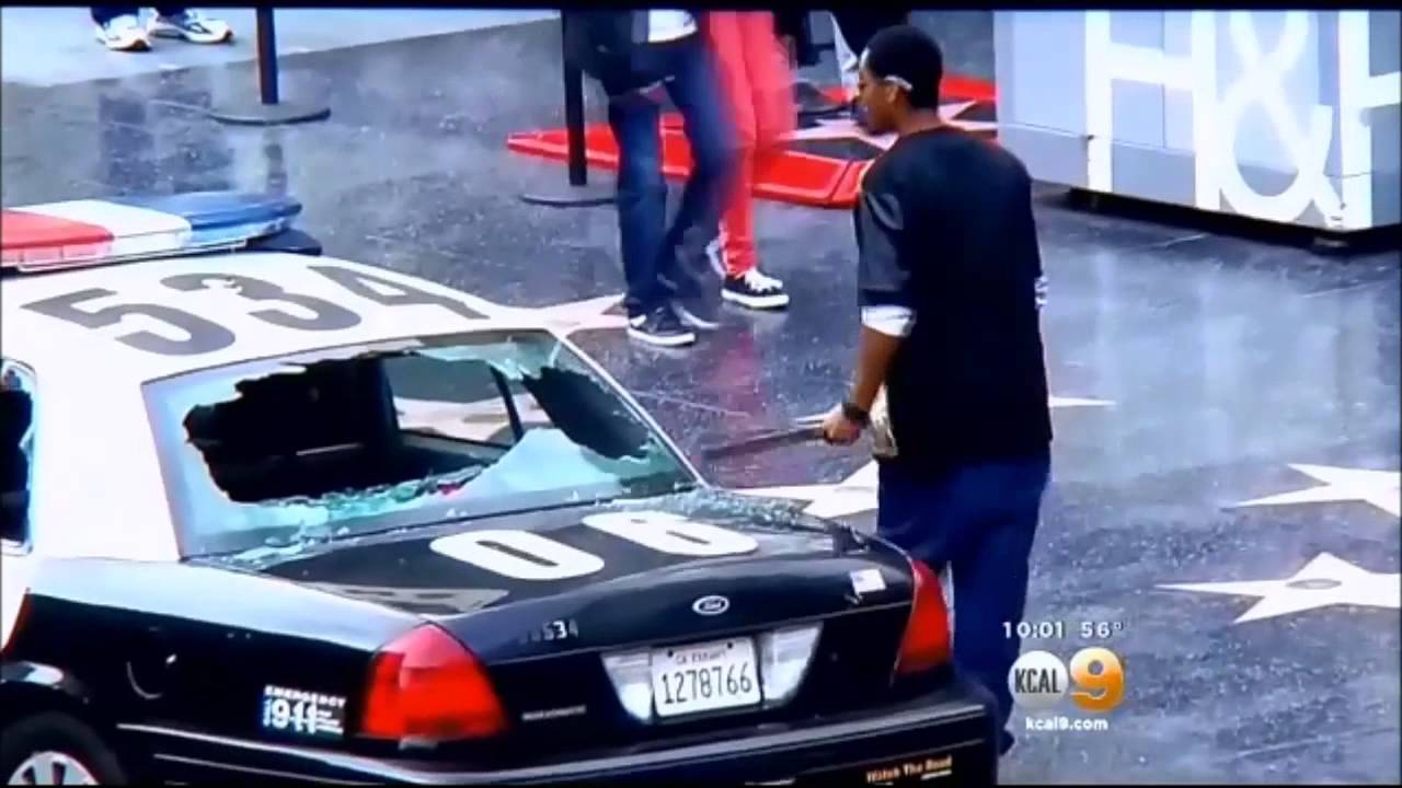 Man smashes out LAPD Car windows in Hollywood - YouTube