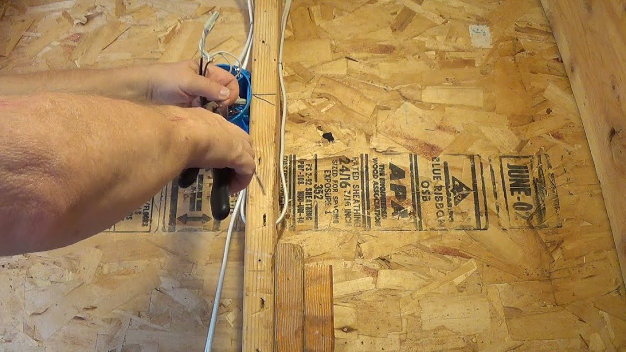 Splicing the 2 wire switch leg cable wires in the light outlet junction ...