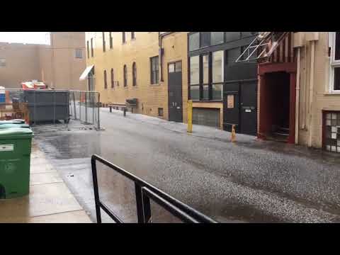 Pea-sized hail falls in downtown Flint