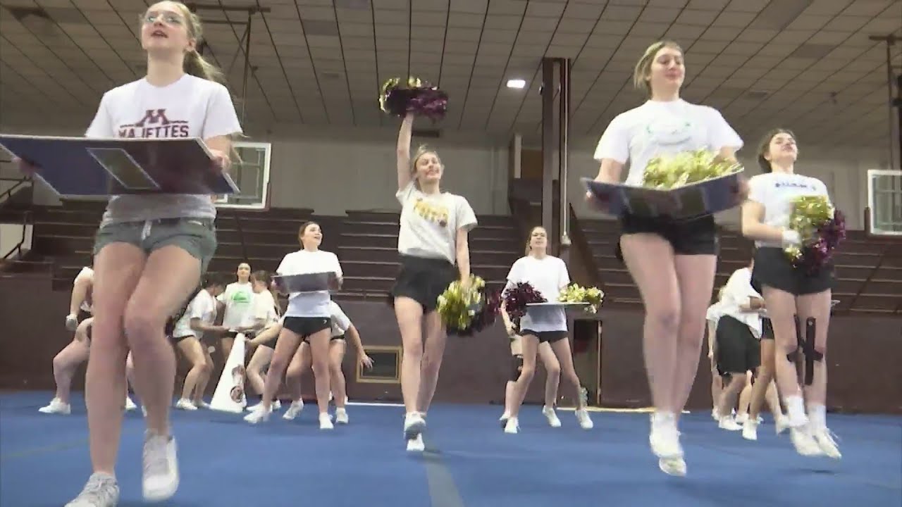 Minot High School Cheer takes home 3 titles - YouTube