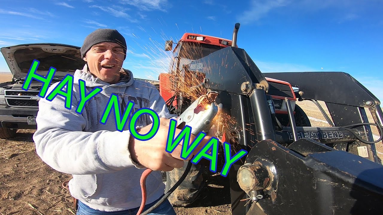 How to jumpstart a tractor with a pickup. Cold day to move the last of ...