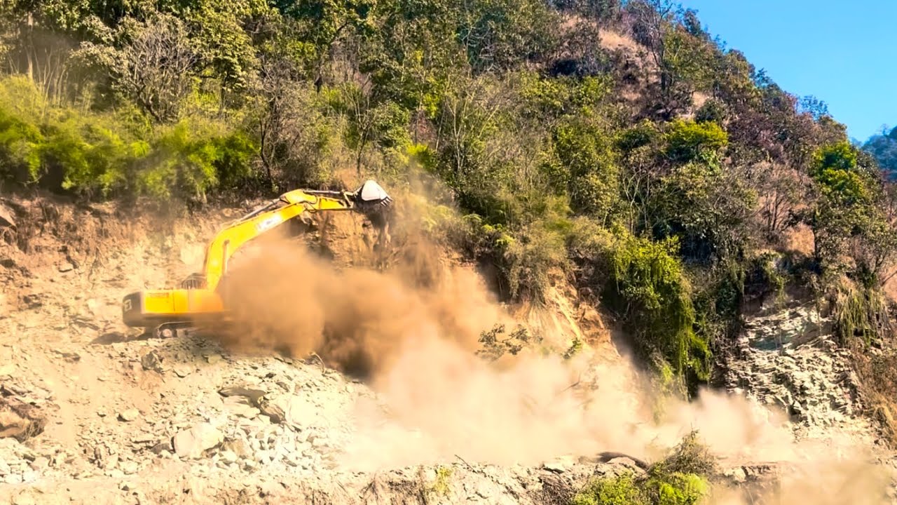 JCB Excavator Working to Improve a Steep Mountain Road Hyundai | JCB ...