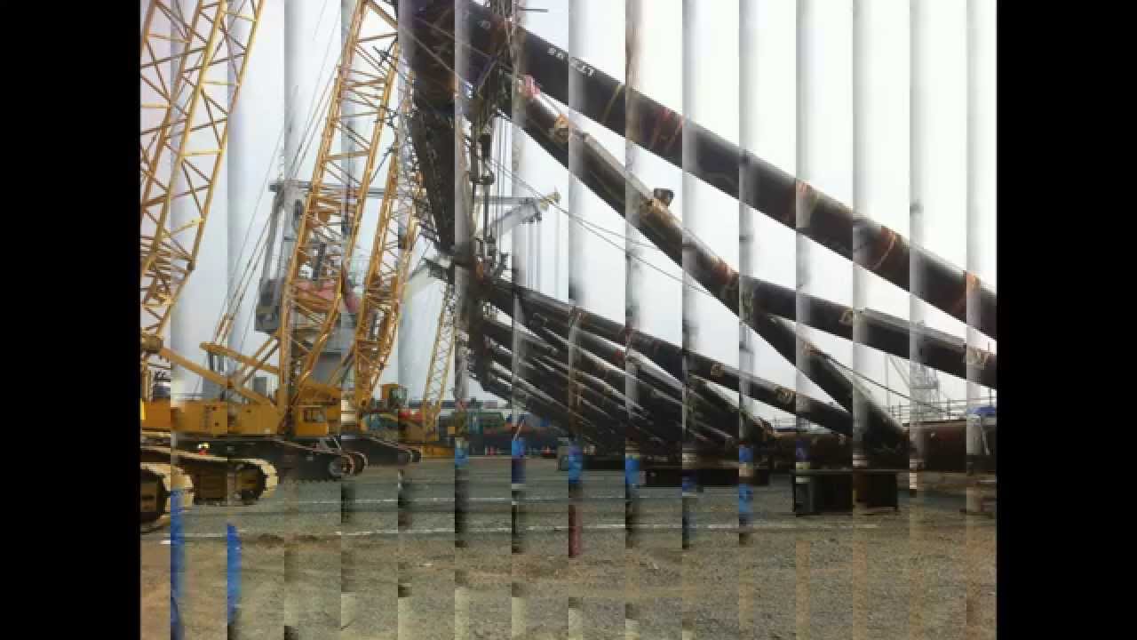 Onshore fabrication Roll up Panle Roll up Row Lifting by cranes - YouTube