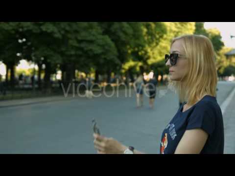 Young Girl Vaporizes the E-Cigarette 02