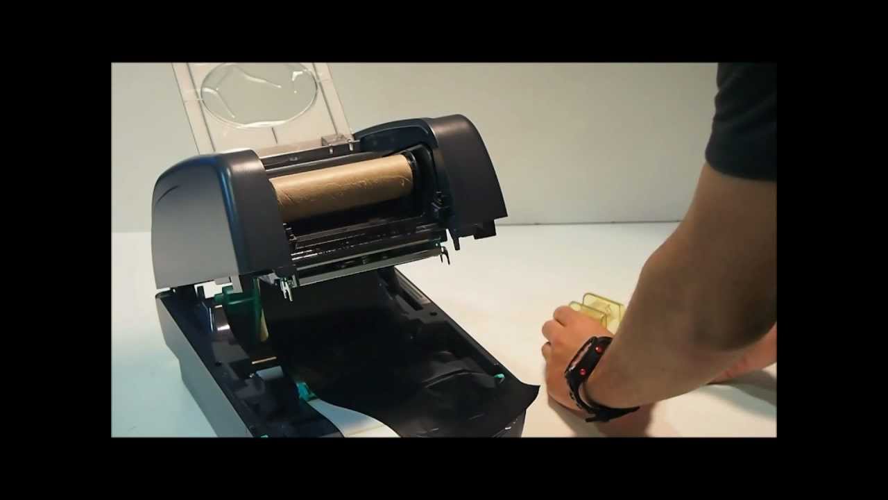 Poner ribbon y etiquetas en impresora de etiquetas TSC TTP 247 - YouTube