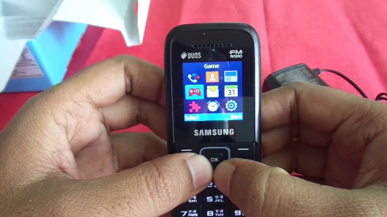 Samsung b110e unboxing - YouTube
