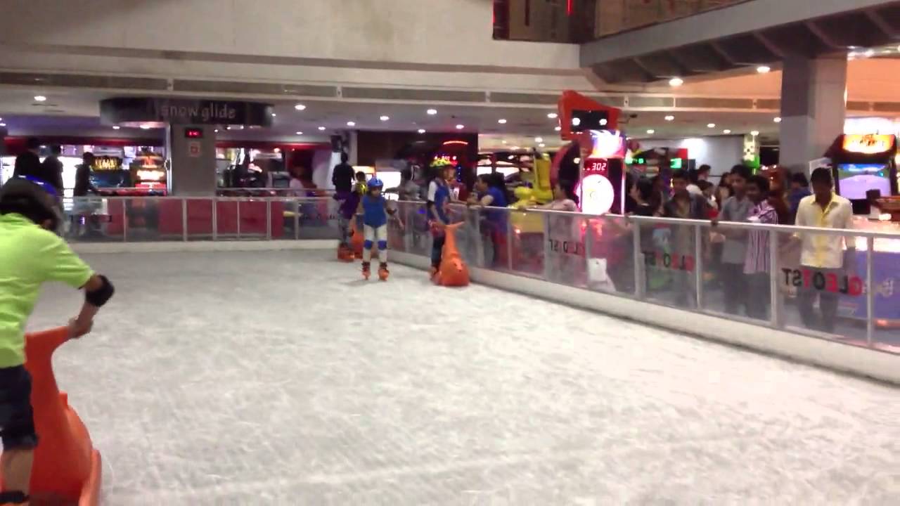Tia ice skating at Neptune Mall 2013 - YouTube