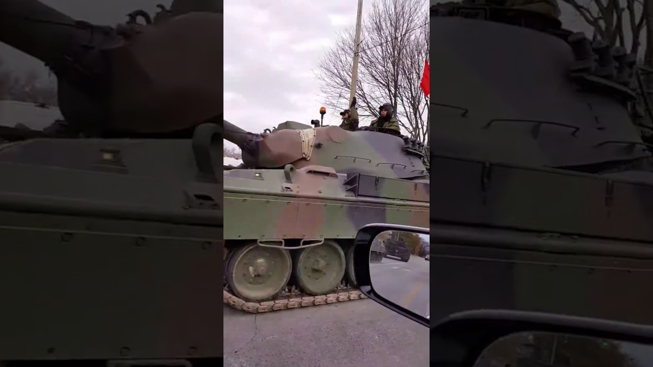 Army tanks roll in - YouTube