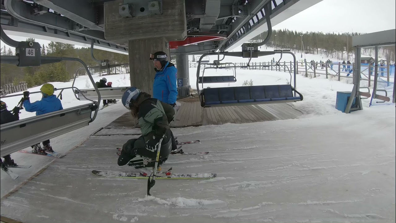 How to get on a chair lift with a sitski. - YouTube