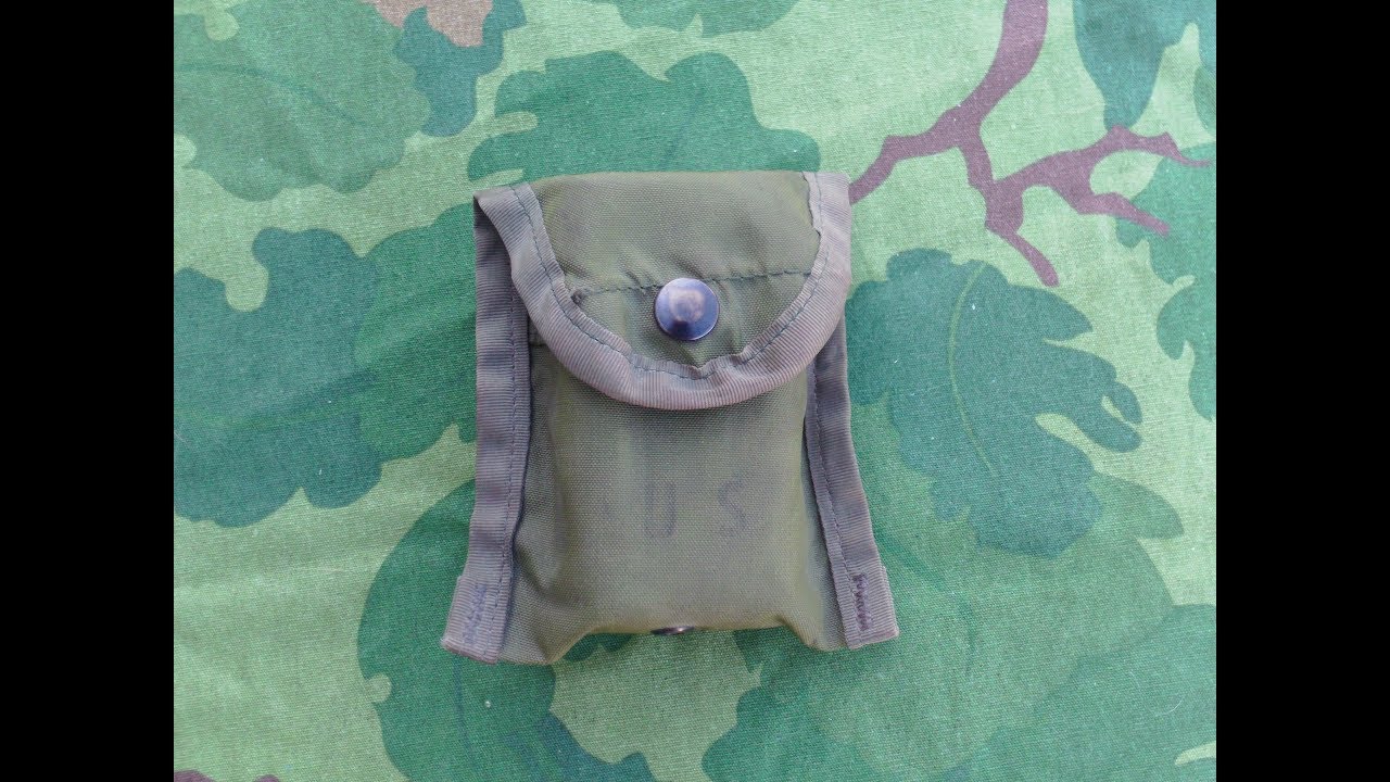 What to keep in your USGI Compass/1st aid pouch (by the book) - YouTube