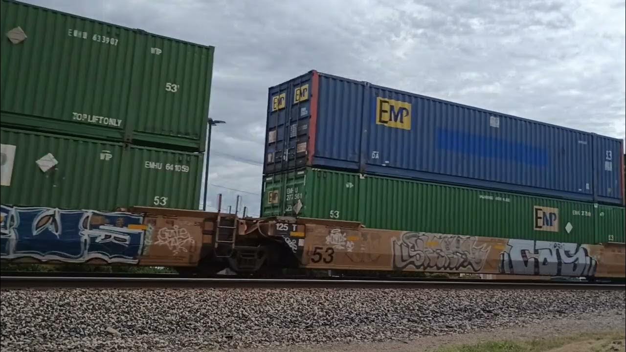 UP 7128 with a double mid train DPU - YouTube