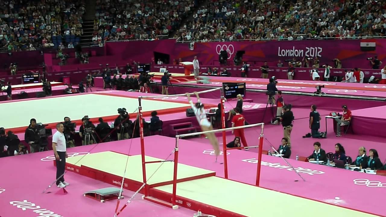 Romanian Female Gymnast on the Unparallel Bars in North Greenwich Arena ...