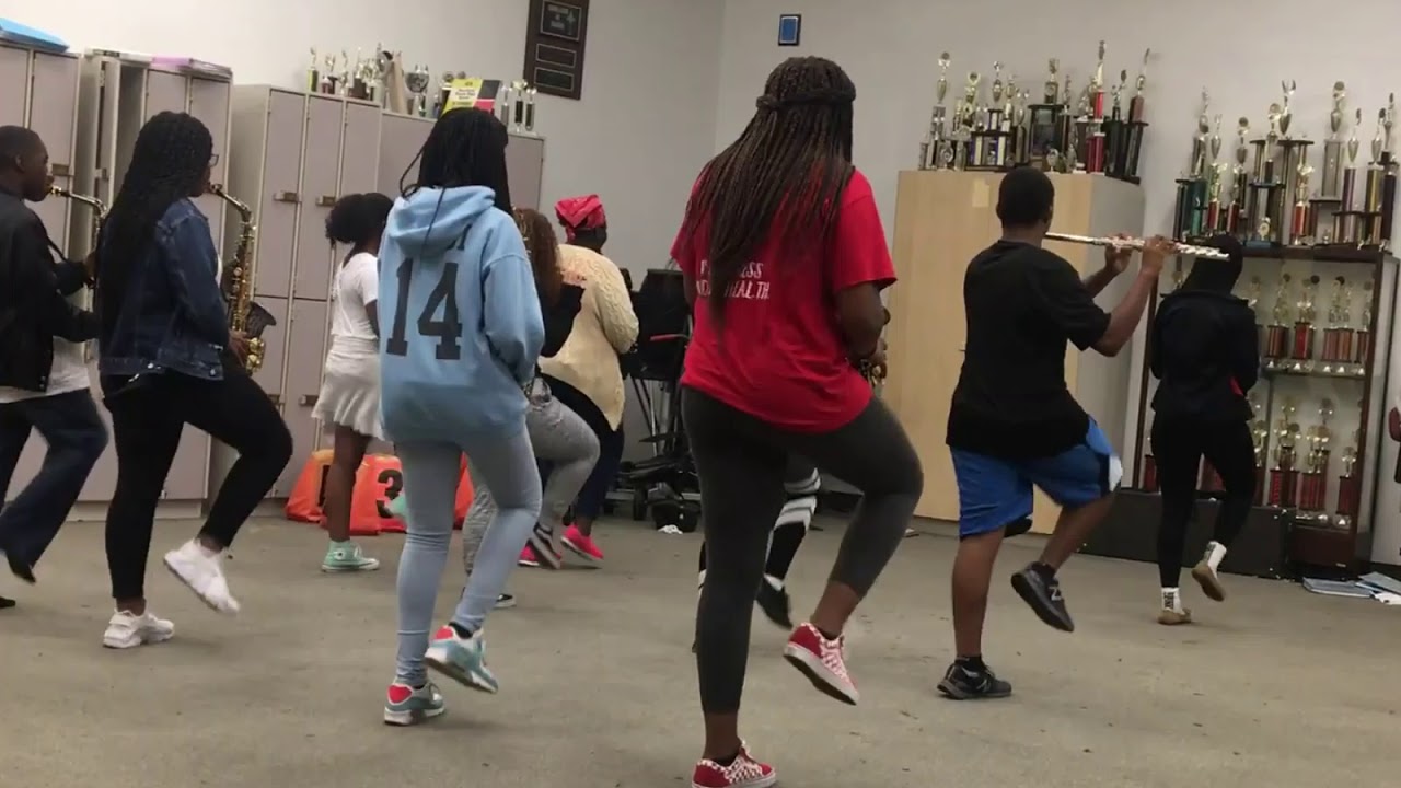 Marching practice in band room - YouTube