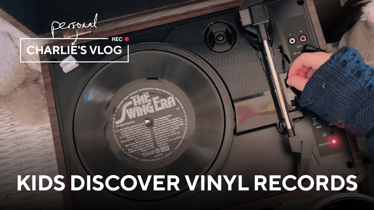 Kids discover Vinyl Records and a turntable - YouTube