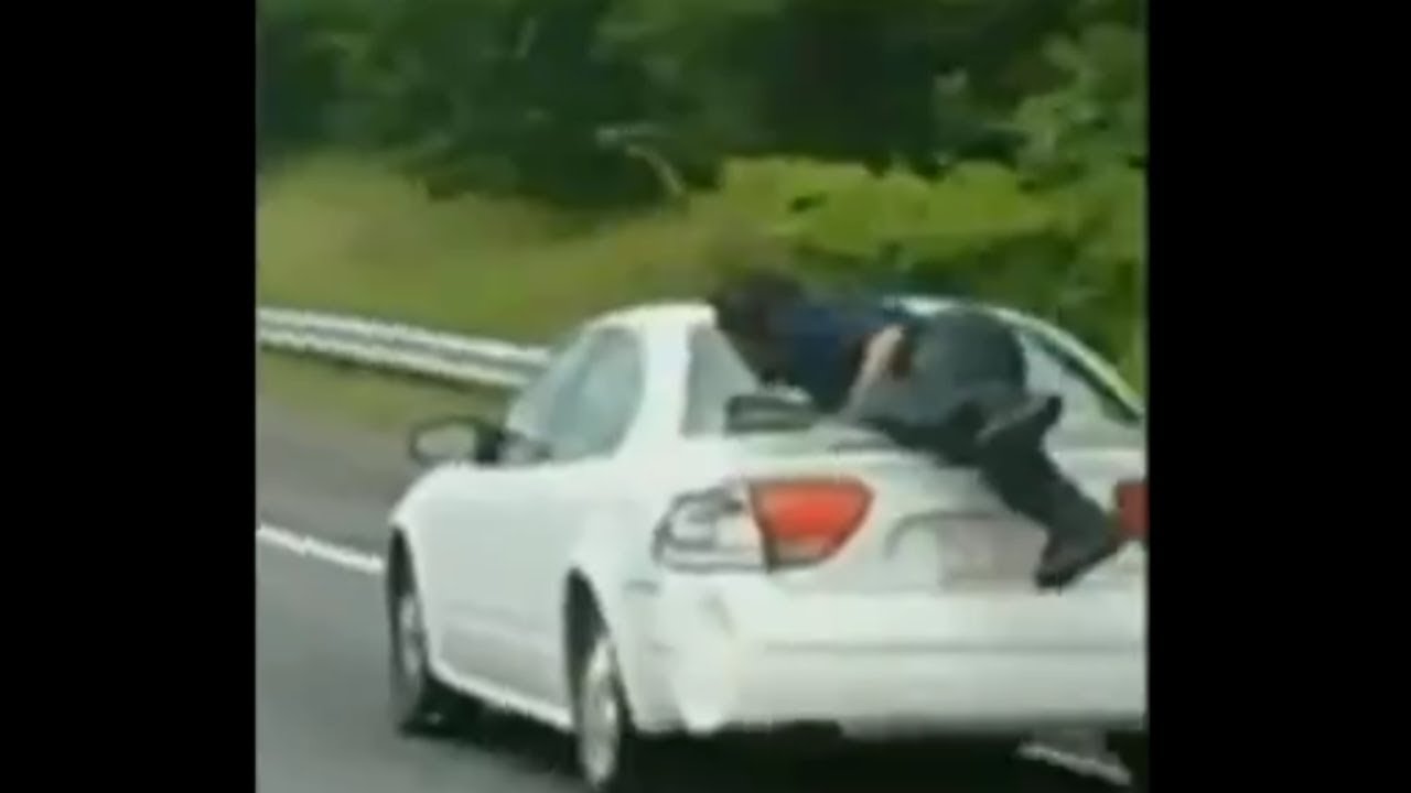 Guy Riding A Car on the Highway - YouTube