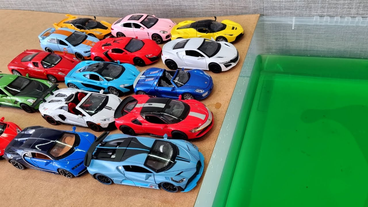 Various spot model cars falling into green water ...