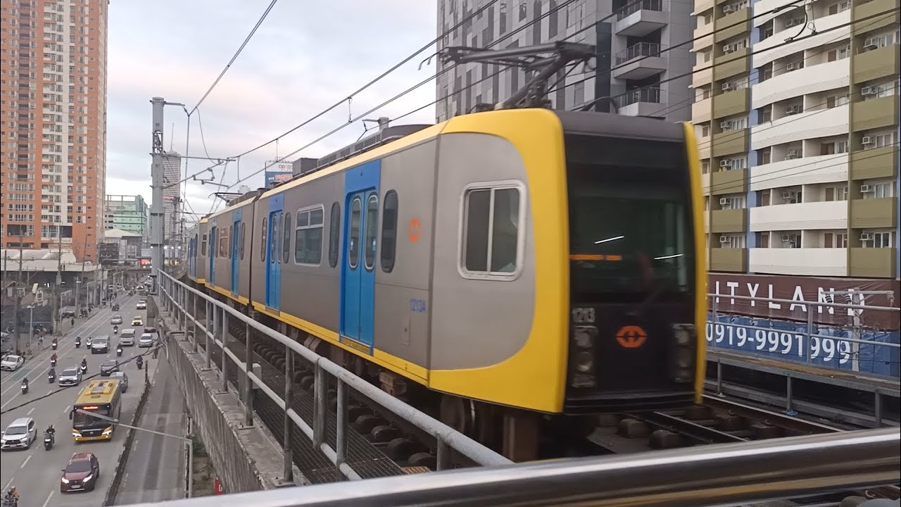 LRT-1 3G Set 4 (former MX-3 train) at Fernando Poe Jr. Station ft ...