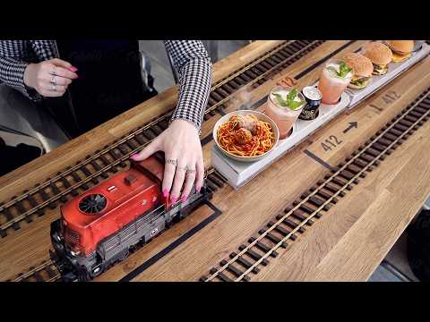 How This Strange Restaurant Delivers Burgers Using Super-Realistic Trains