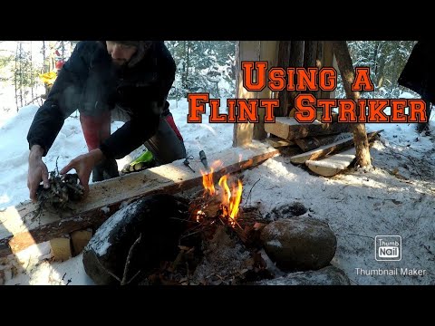 Making a FIRE with a FLINT STRIKER at the fort in the woods - YouTube