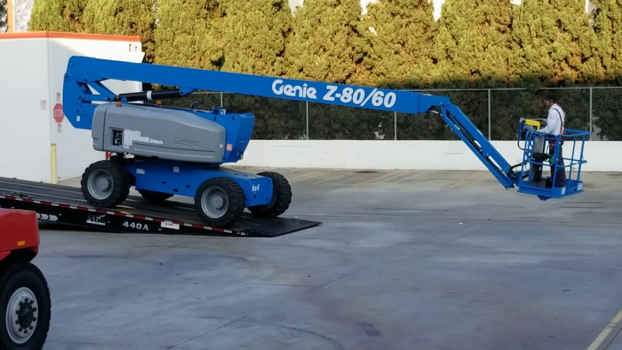 Lorenzo Loading The Genie 80ft. Boom Lift for delivery to customer. TLA ...