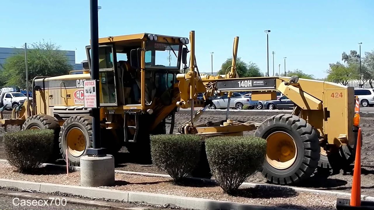 CAT 140H Grader Windrowing Crushed Asphalt - YouTube