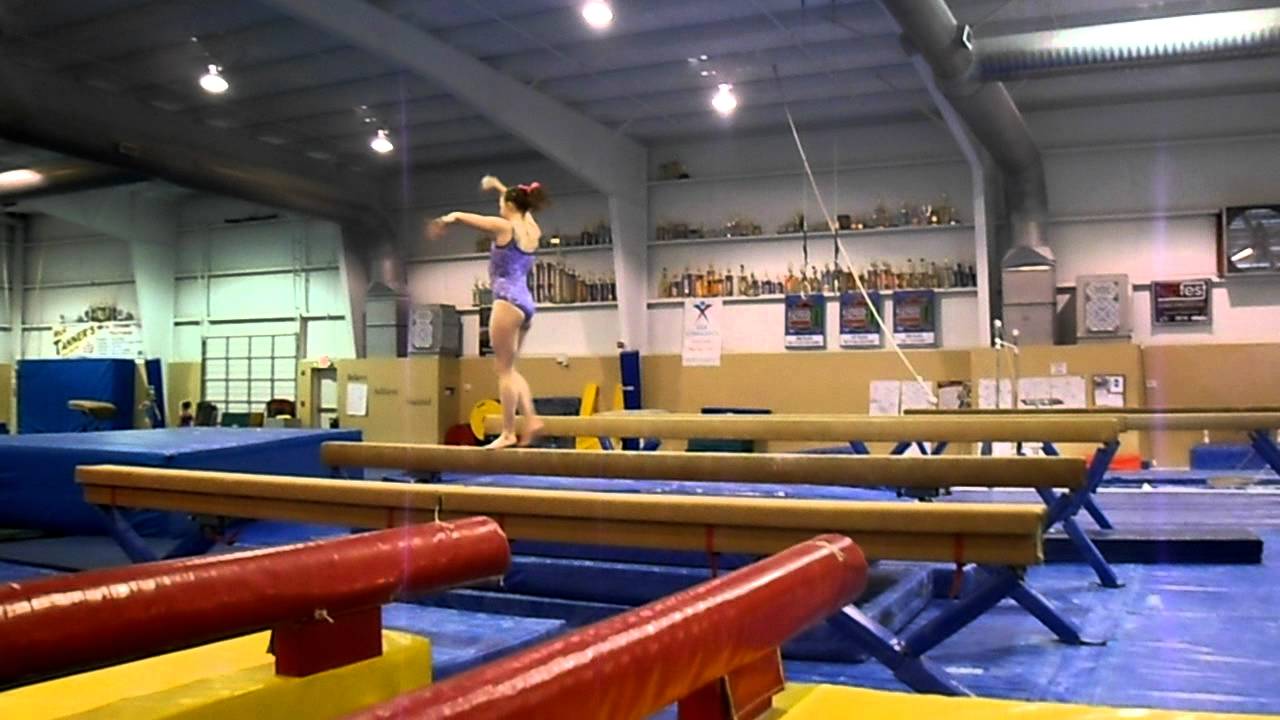 Ariel's Back Handsrping Back Layout on Beam - YouTube