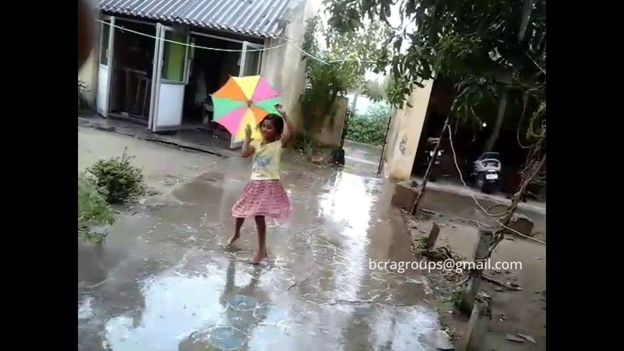 Cute baby girl Dancing in the Rain - Kid Playing in the Rain / Happy ...