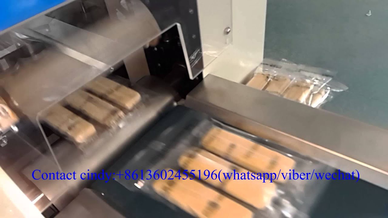 Automatic wafer biscuit packing machine wrapping machine - YouTube
