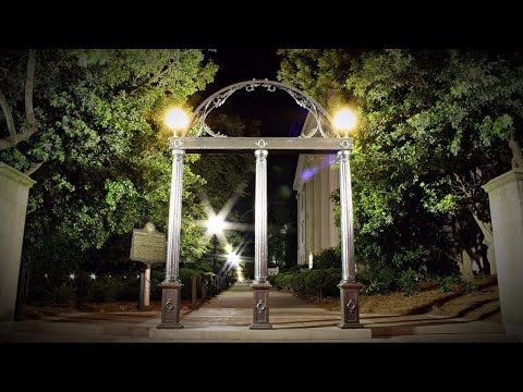 Graduation night | UGA students walk under famed Arch in Athens - YouTube