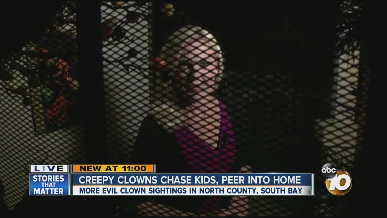Creepy clowns chase kids, peer into home - YouTube