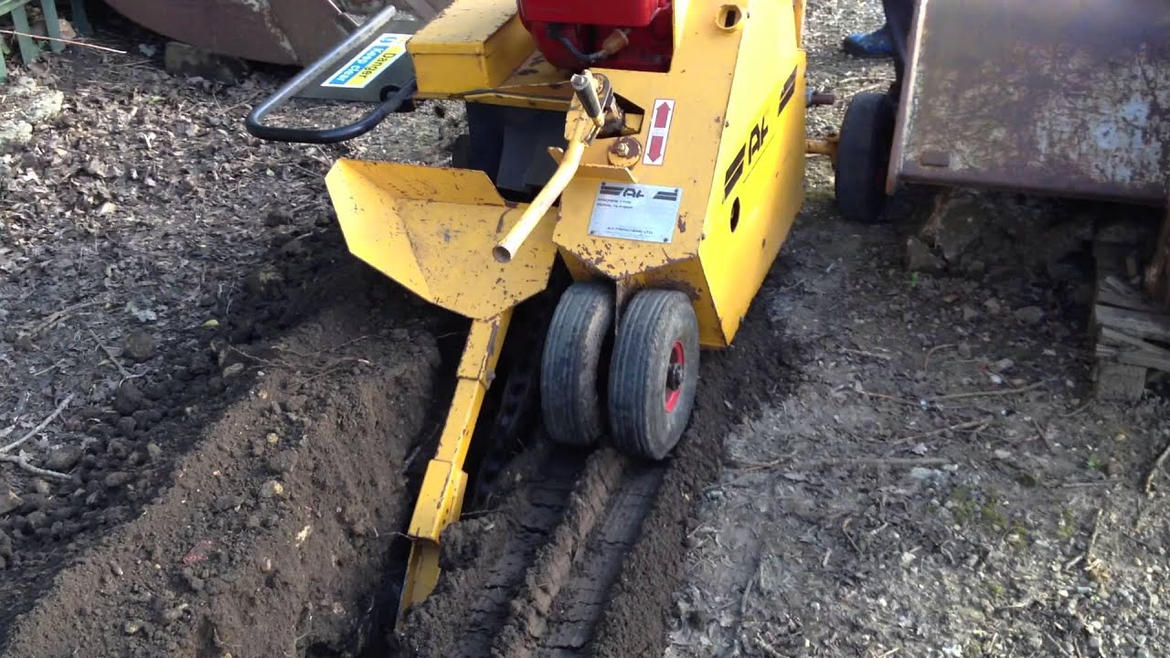 AFT TRENCHER DIGS A DITCH - YouTube