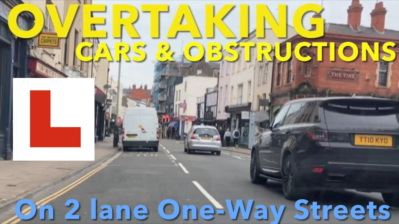 Overtaking cars and other obstructions in the left lane on a 2 lane one ...