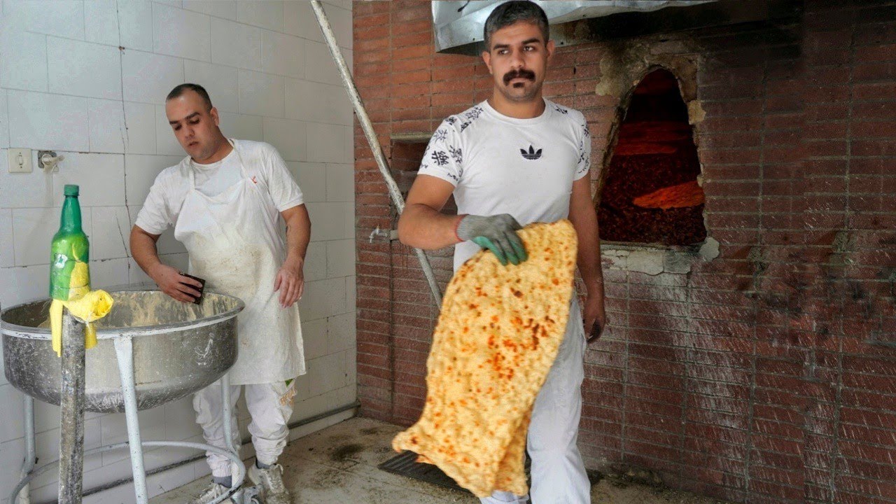 Baking Sangak bread, traditional and popular Iranian bread|bread making ...