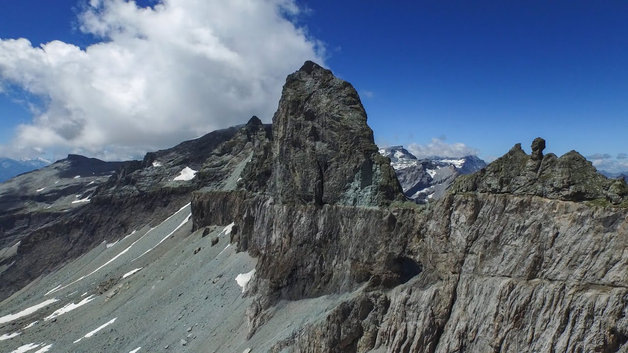 Amazing Drone Video - Flight through mountain hole 4k - YouTube