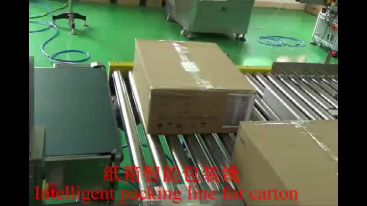 Automatic carton sealing labeling strapping end packaging line - YouTube