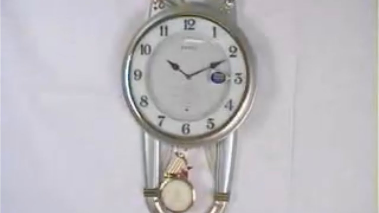 Seiko QXM121MRH Melodies In Motion Clock - YouTube